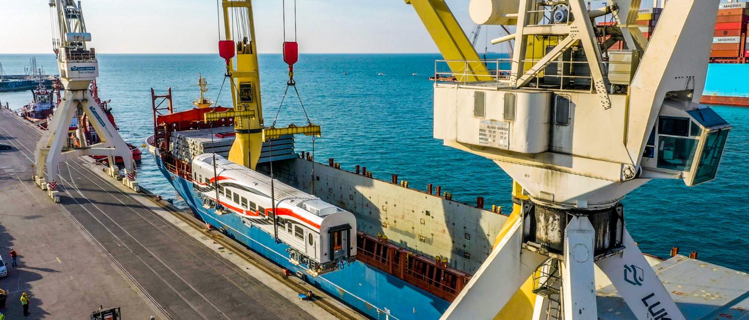 Heavy-lift ship gets trains to the track - Delivered - Global