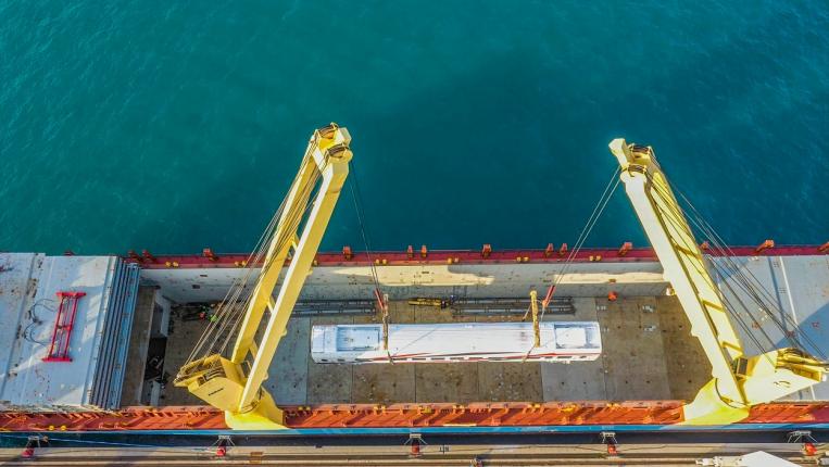 Heavy-lift ship gets trains to the track - Delivered - Global